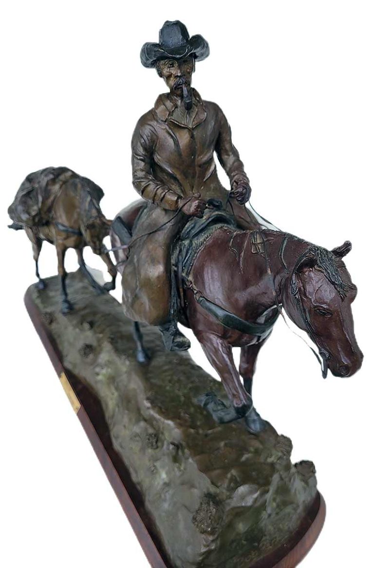 Bob Parks bronze sculpture | Topping Out a pack horse