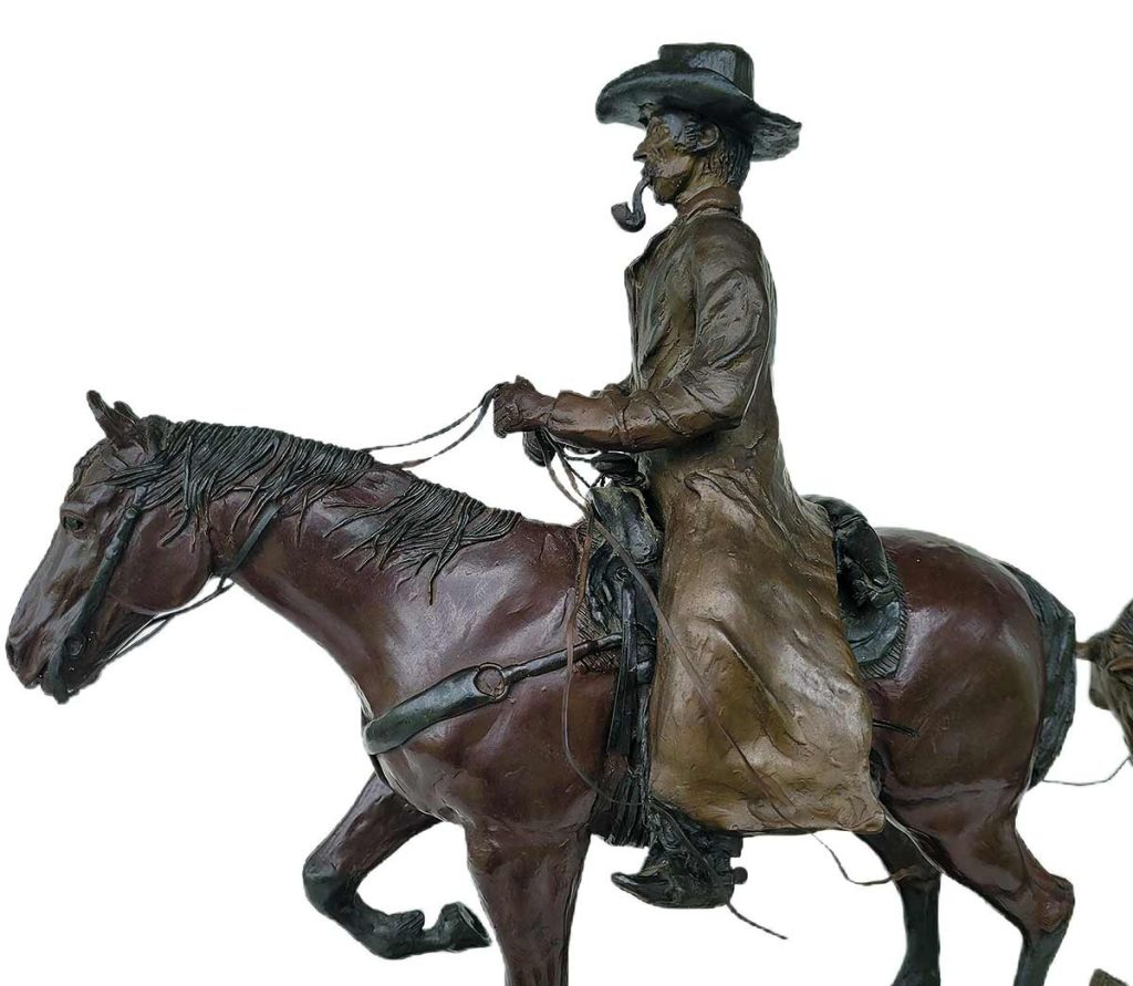 Bob Parks bronze sculpture | Topping Out a pack horse